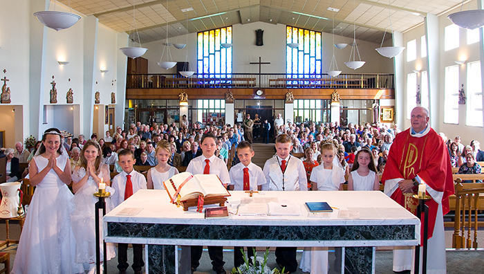 The third group of children to receive the Eucharist for the first time ...